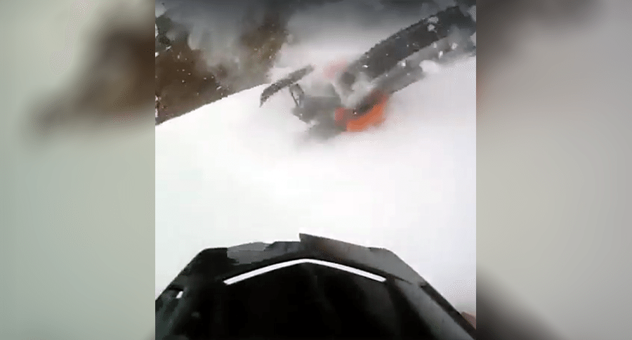 The Snowmobile Won't Stop Rolling in This Crazy Crash