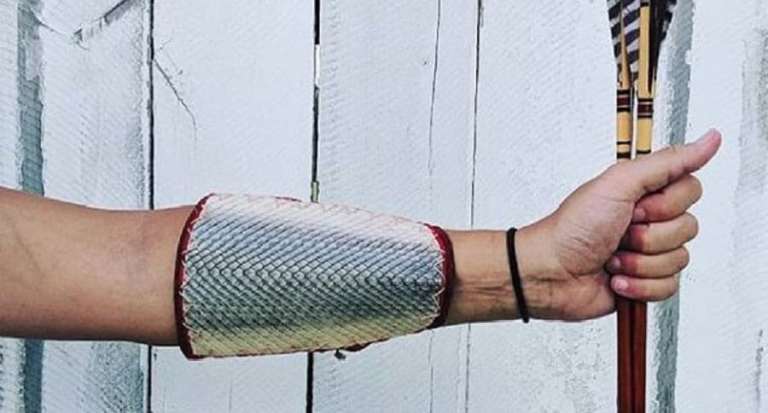 Pics: Creative Huntress Constructs Archery Arm Guard Out of Gar Skin