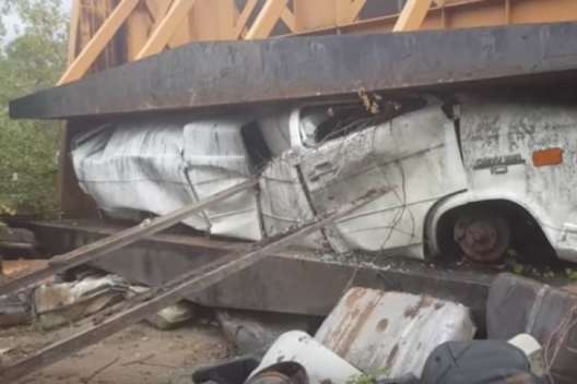 Watch a White Chevy Van Get Pancaked by a Crushing Machine - Wide Open ...