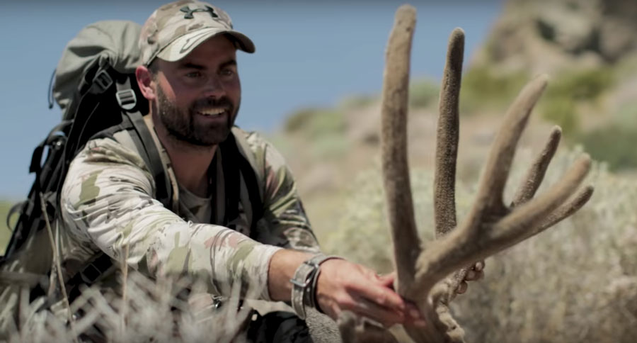 Hunters Stalk Pronghorn Behind Giant Cow Cutout - Wide Open Spaces