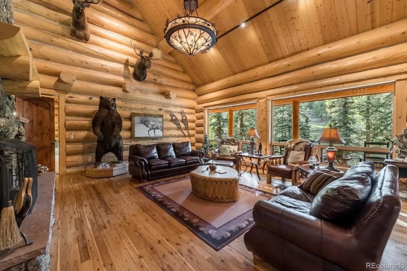 Check Out This Incredible Colorado Log Cabin Home with a Trout Pond and ...